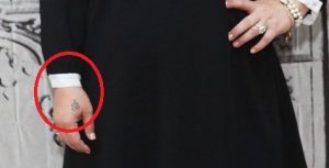 Kelly Clarkson's 14 Tattoos & Their Meanings - Body Art Guru