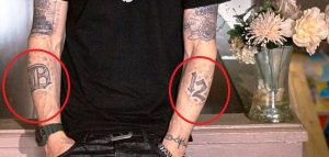 Eminem's 9 Tattoos & Their Meanings - Body Art Guru