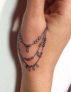 Lil Debbie's 33 Tattoos & Their Meanings - Body Art Guru