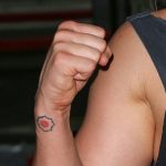 Ronda Rousey's 9 Tattoos & Their Meanings - Harvey Mandivether