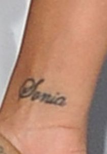 Erica Mena's 9 Tattoos & Their Meanings - Body Art Guru