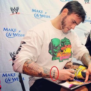 CM Punk's 52 Tattoos & Their Meanings - Body Art Guru