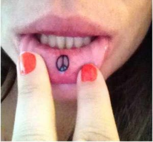 27 Amazing Peace Tattoo Ideas with Meanings - Body Art Guru