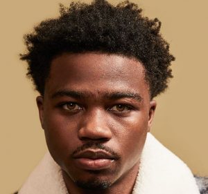 Roddy Ricch's 5 Tattoos & Their Meanings - Body Art Guru