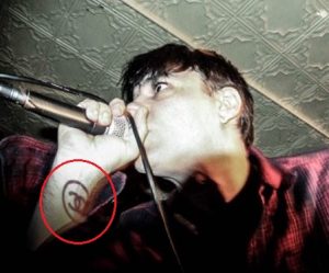 Cage (Rapper) 3 Tattoos & Their Meanings - Body Art Guru