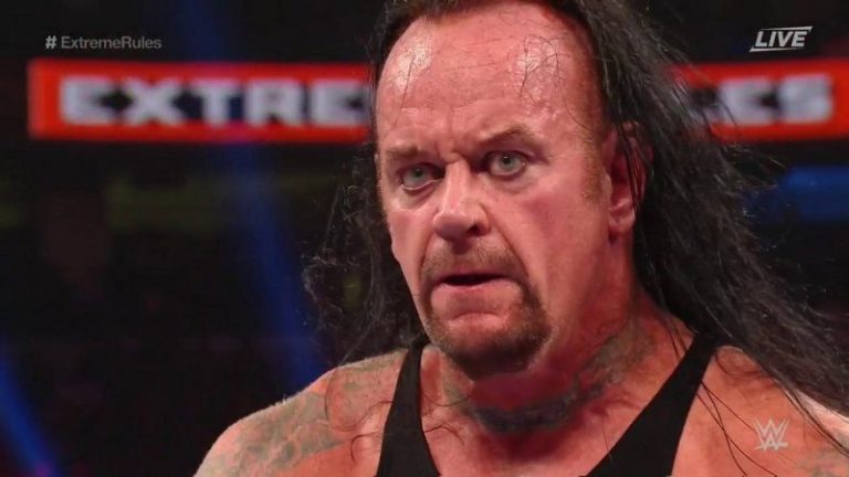 Undertaker's 4 Tattoos & Their Meanings - Body Art Guru