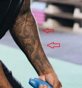 Ezekiel Elliott's 14 Tattoos & Their Meanings - Body Art Guru