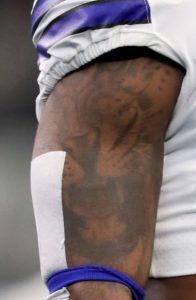 Ezekiel Elliott's 14 Tattoos & Their Meanings - Body Art Guru