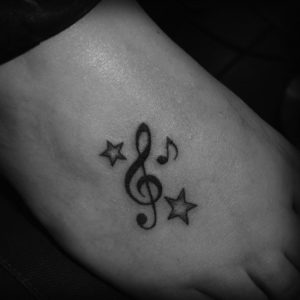 115 Creative Musical Note Tattoo Designs - Body Art Guru