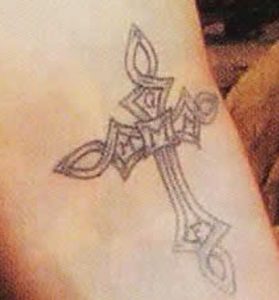 Tim McGraw's 4 Tattoos & Their Meanings - Body Art Guru