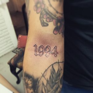 10 Amazing "1994" Tattoo Designs - Body Art Guru
