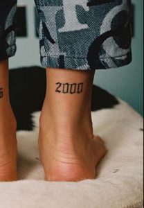 10 Amazing "2000" Tattoo Designs with Celebrities - Body Art Guru
