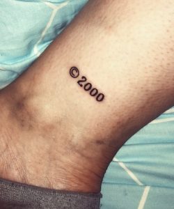 10 Amazing "2000" Tattoo Designs with Celebrities - Body Art Guru