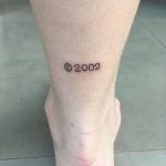 10 Amazing "2002" Tattoo Designs - Body Art Guru