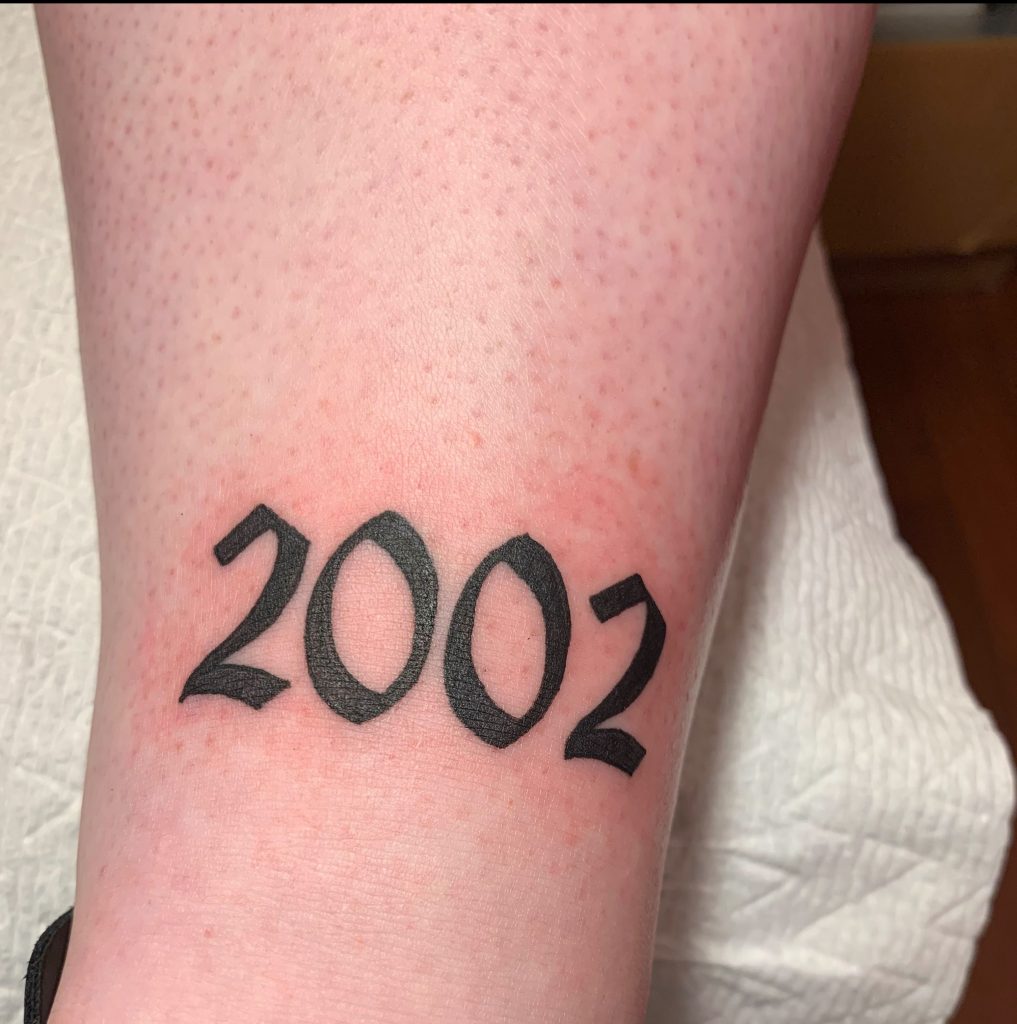 10 Amazing "2002" Tattoo Designs - Body Art Guru