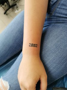 10 Amazing "2002" Tattoo Designs - Body Art Guru