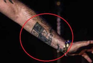 Robbie Williams' 22 Tattoos & Their Meanings - Body Art Guru