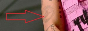 Tyla Yaweh 40 Tattoos & Their Meanings - Body Art Guru