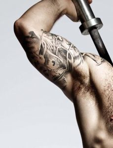 Mat Fraser's 5 Tattoos & Their Meanings - Body Art Guru