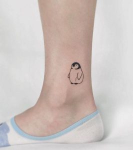 45+ Penguin Tattoos with Meanings - Body Art Guru