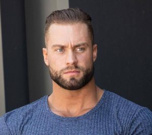 Chris Bumstead's 2 Tattoos & Their Meanings - Body Art Guru