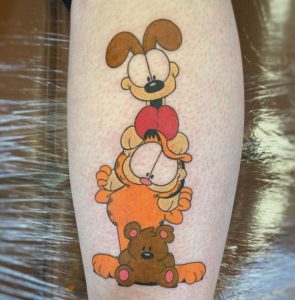 30+ Amazing Garfield Tattoo Designs with Meanings and Ideas - Body Art Guru