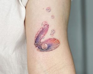 50+ Amazing Pearl Tattoos Designs with Meanings, Ideas, and Celebrities ...