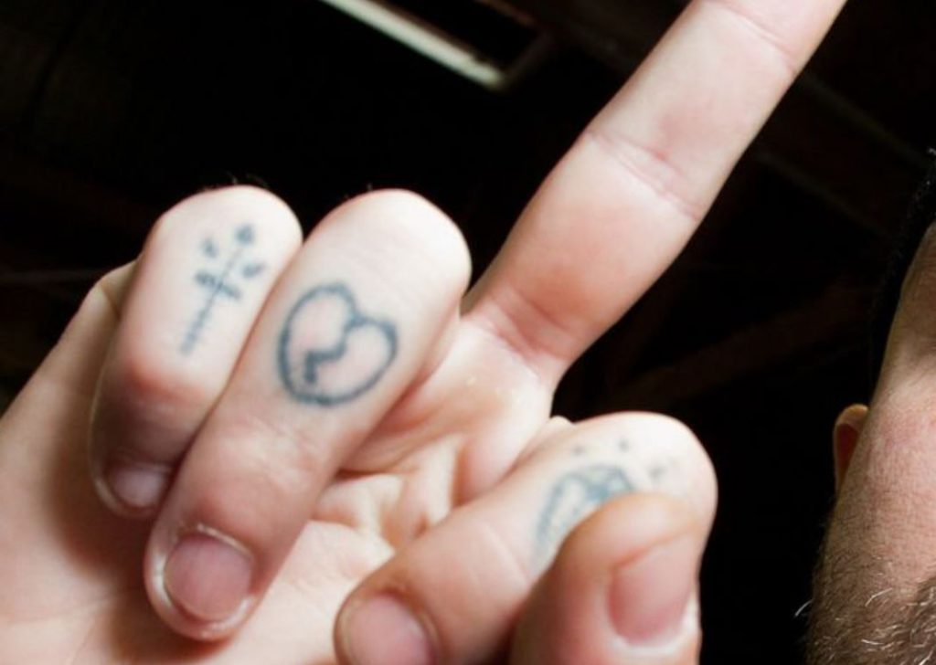 Skinhead Rob's 21 Tattoos & Their Meanings - Body Art Guru