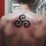 12 Triskelion Tattoo Designs with Meanings and Ideas - Body Art Guru