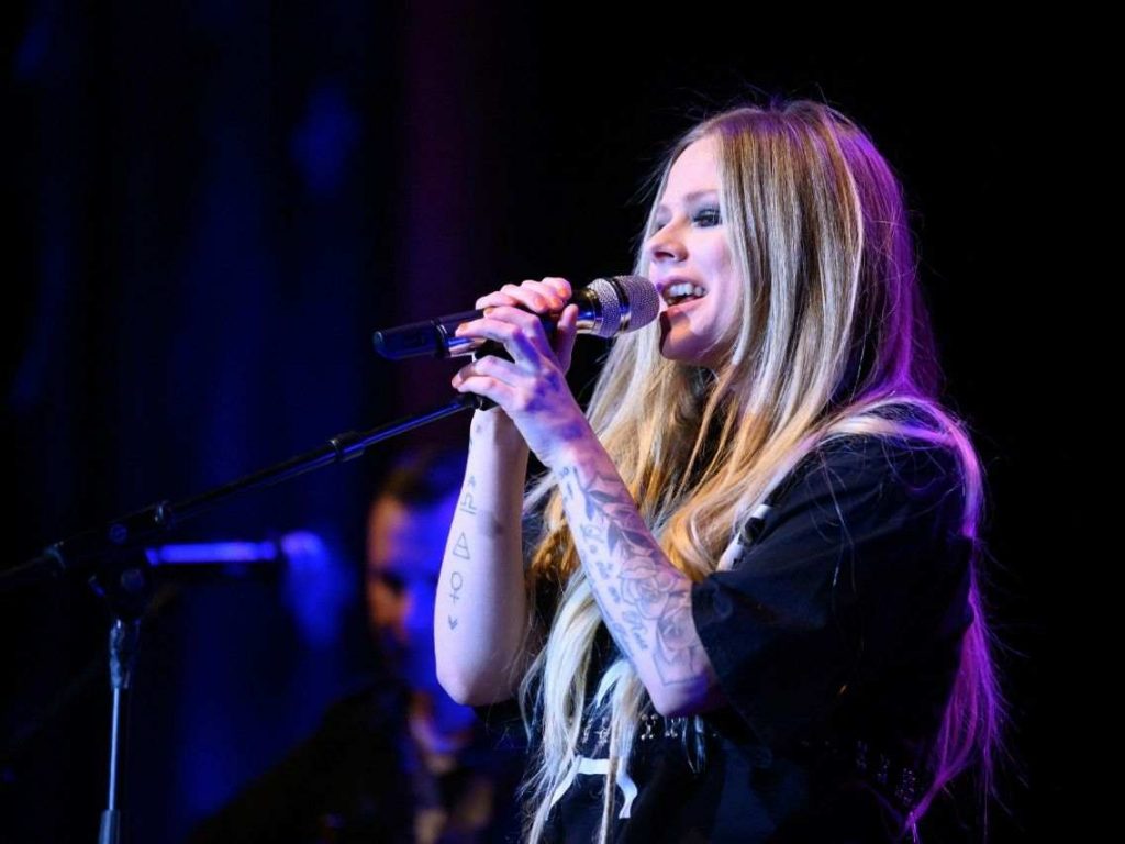 25 Celebrities with Incredible Rose Tattoo Designs - Body Art Guru