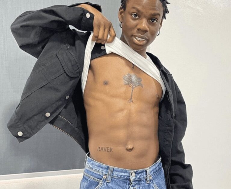 Rema's (Singer) 13 Tattoos and their Meanings - Body Art Guru