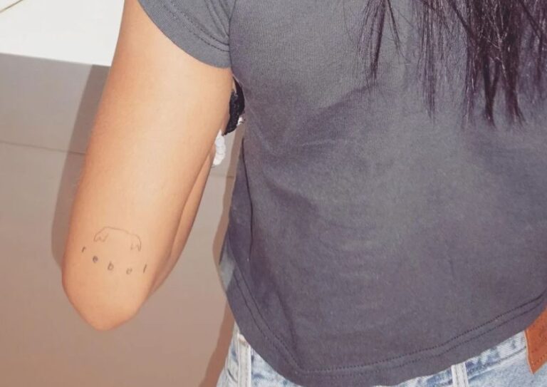 Charli D'Amelio's 14 Tattoos and Their Meanings - Body Art Guru